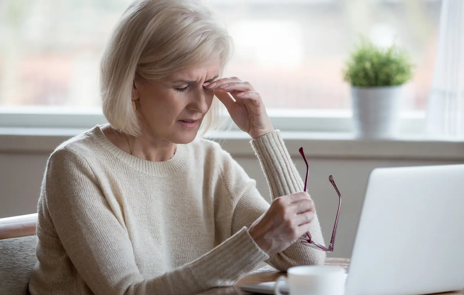 What is macular degeneration or yellow spot disease?